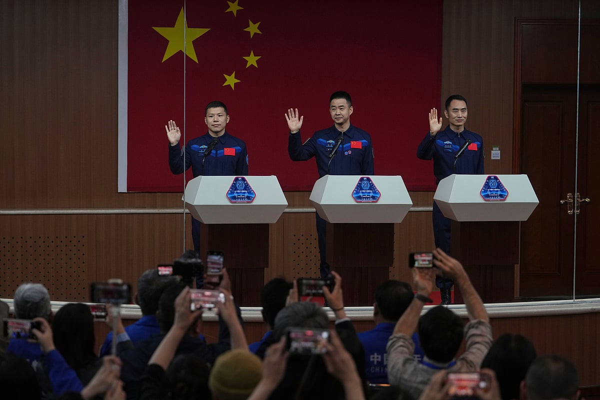 Three Chinese astronauts return from space station after nine-day delay ...