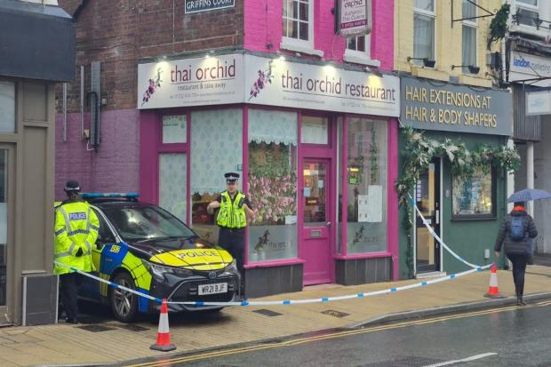 City centre restaurant cordoned off by police with officers guarding ...