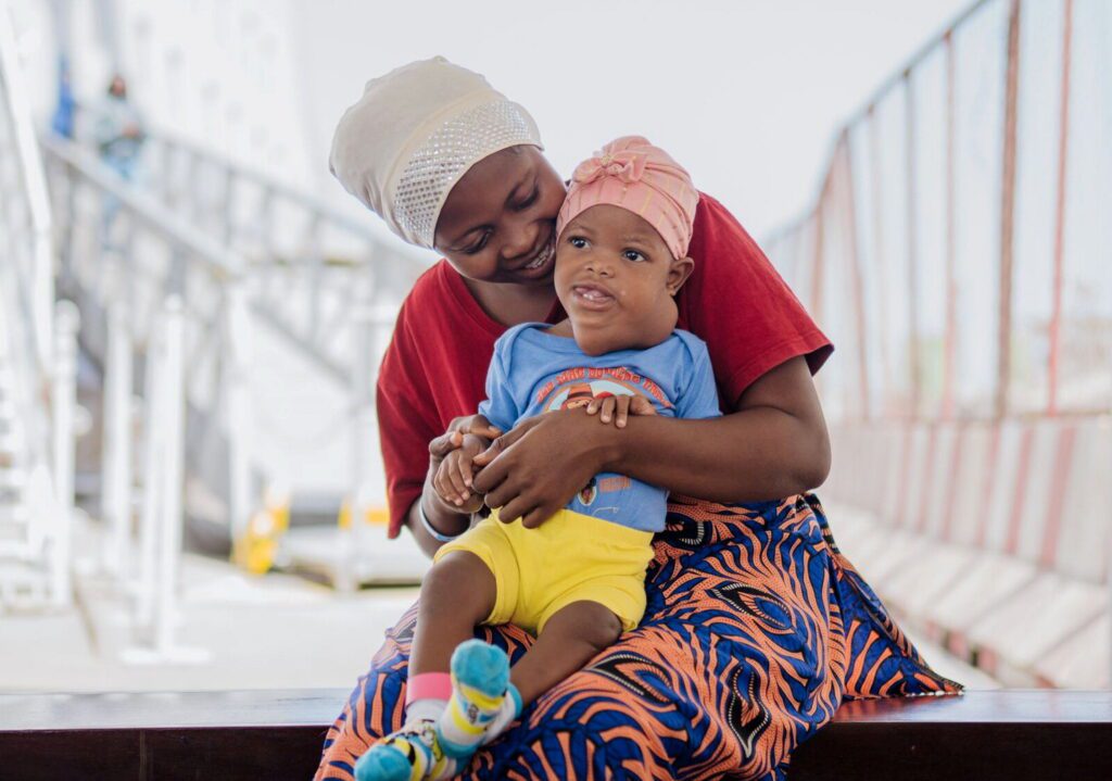 Brit surgeon saves baby’s life by removing tumour the size of her face