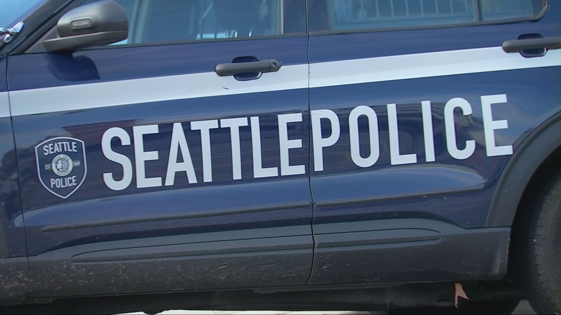Woman arrested after allegedly spitting on Seattle police officer ...