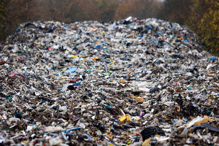 Britain's biggest ever fly tip revealed with 500ft long pile of waste ...