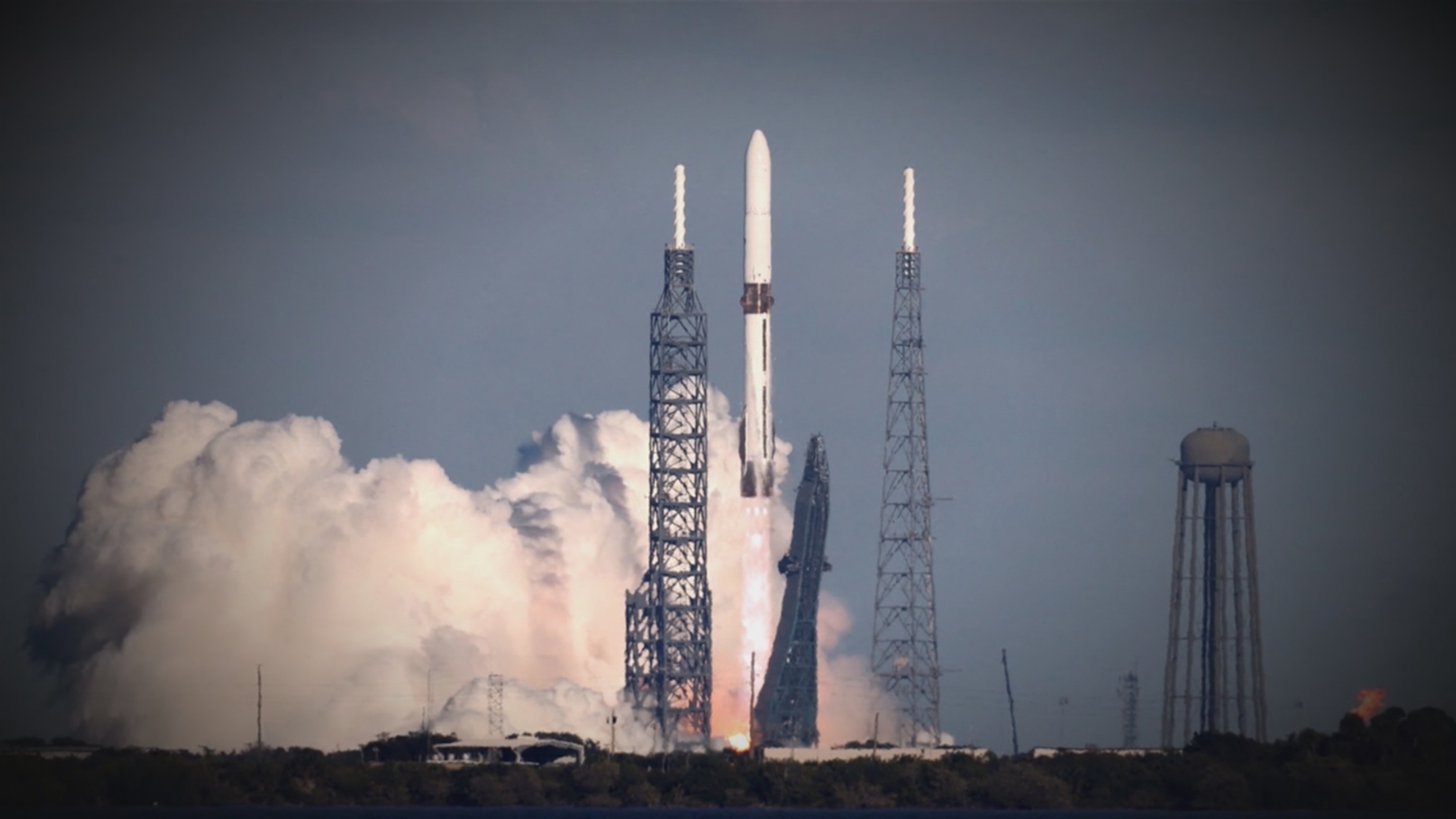 Jeff Bezos' Blue Origin lands booster in space race milestone