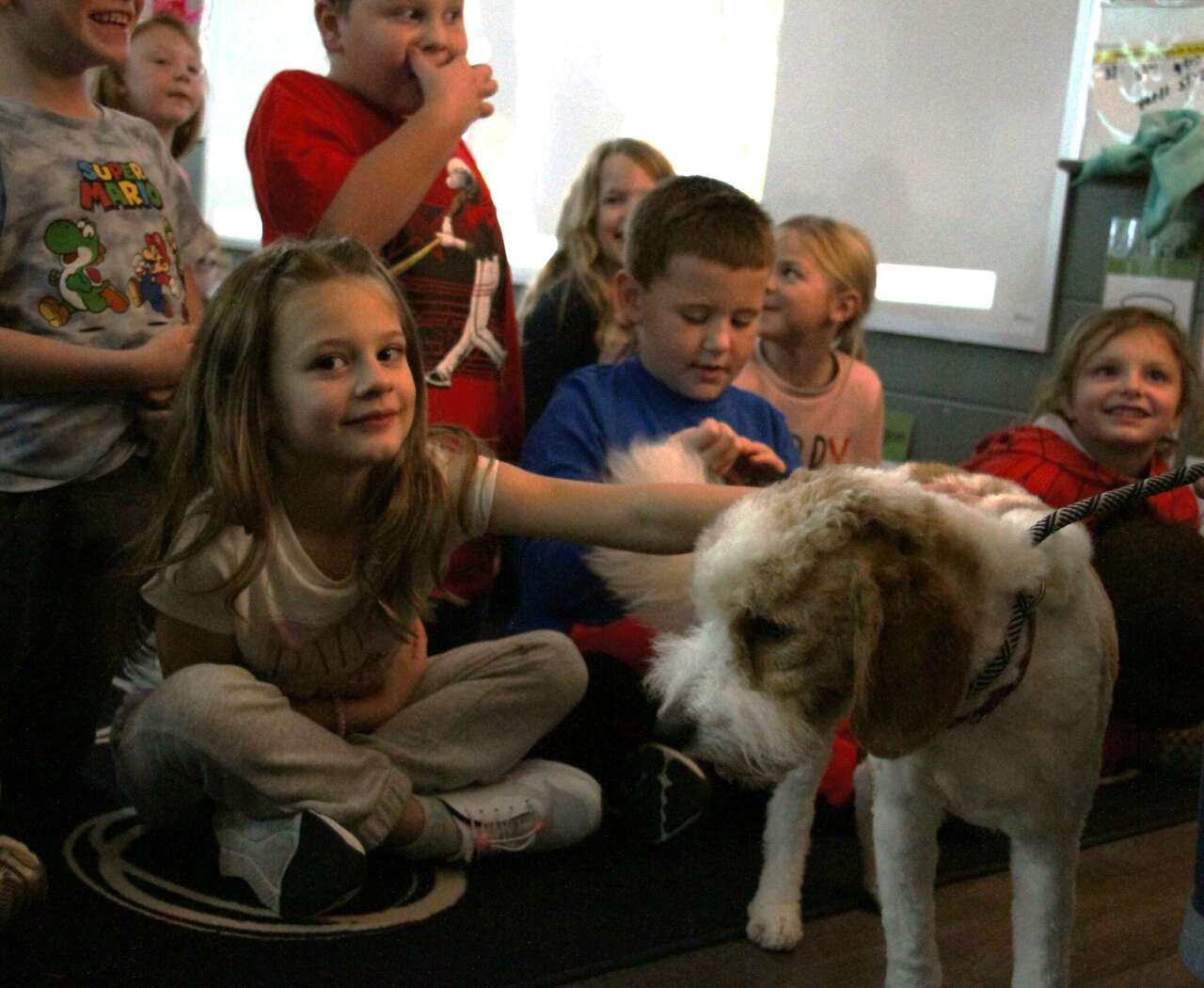 Scout the therapy dog lifts spirits across Laker Elementary