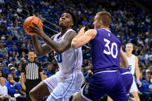 Kennard Davis scores 18 points in return from suspension as BYU wins