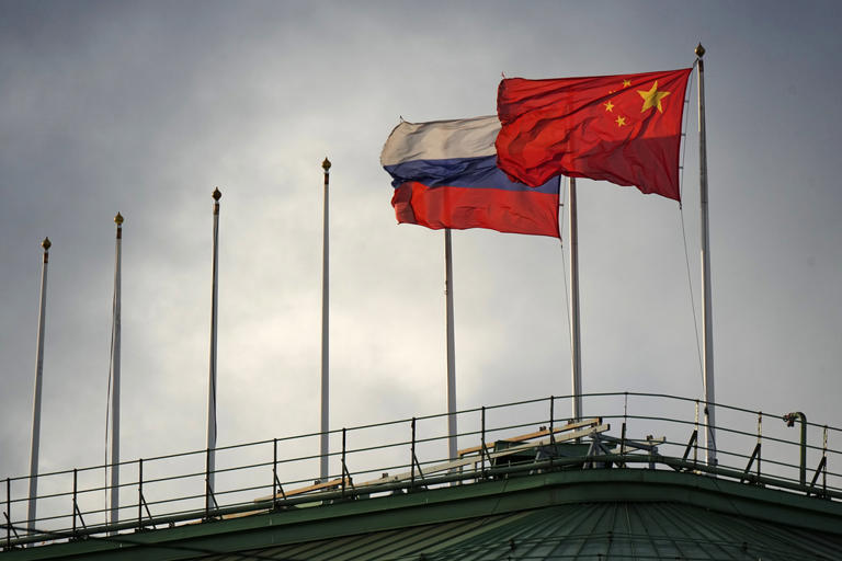 Chinese astronauts return from space station after delay blamed on ...