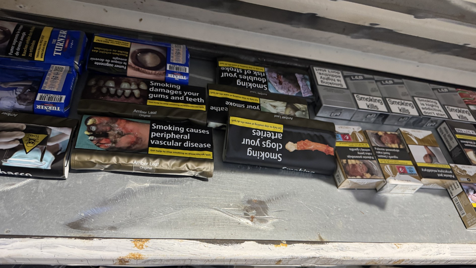 Illicit cigarettes found under fake shop floors