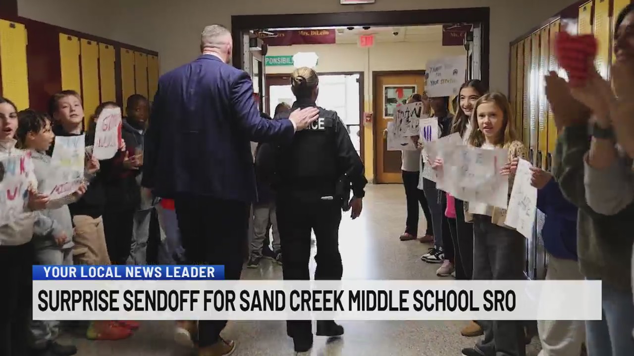 Surprise sendoff for Sand Creek Middle School SRO