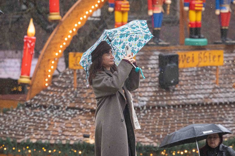 Birmingham Christmas Market fans brave Storm Claudia as rain lashes down