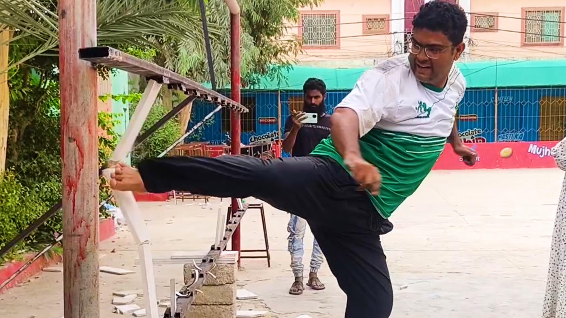 Most marble slabs broken by jumping back kicks in one minute - 15 by ...