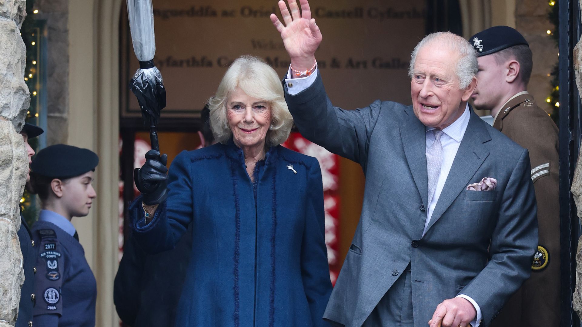 King Charles braves the rain with Queen Camilla to celebrate 77th ...