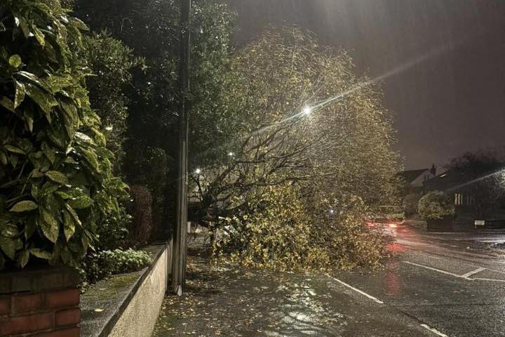 Storm Claudia causes chaos after a fallen tree blocks a busy Wigan road