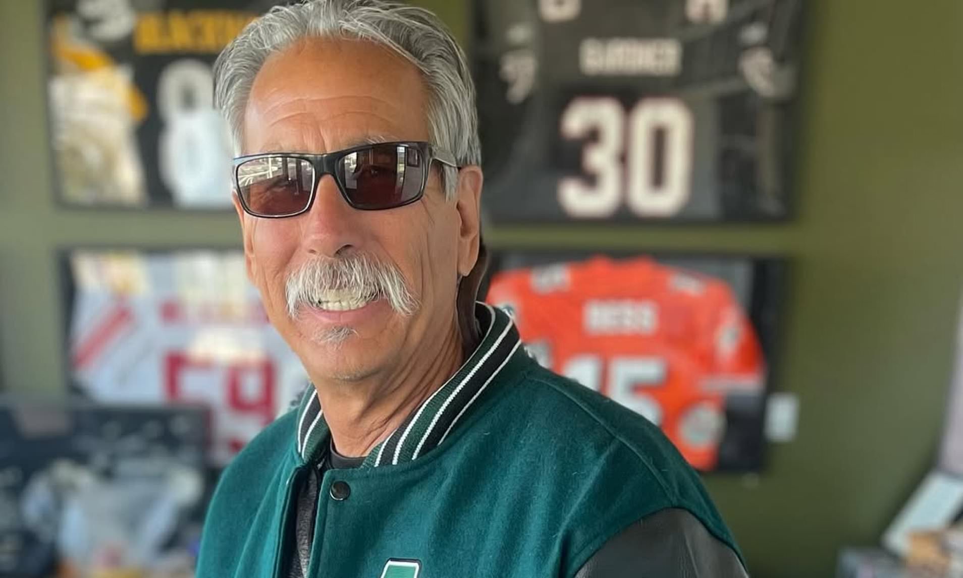 Suspect in custody after shooting of college football icon, 66, on ...