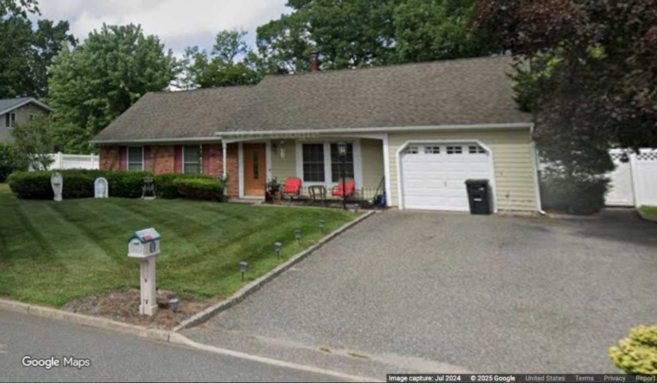 Coram Neighbor Charged With Setting House Fire