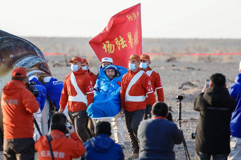 Chinese astronauts return from space station after delay blamed on ...