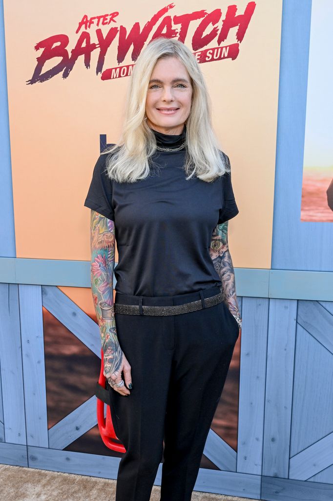 Baywatch's Erika Eleniak now sports alternative look to swimsuit-clad ...