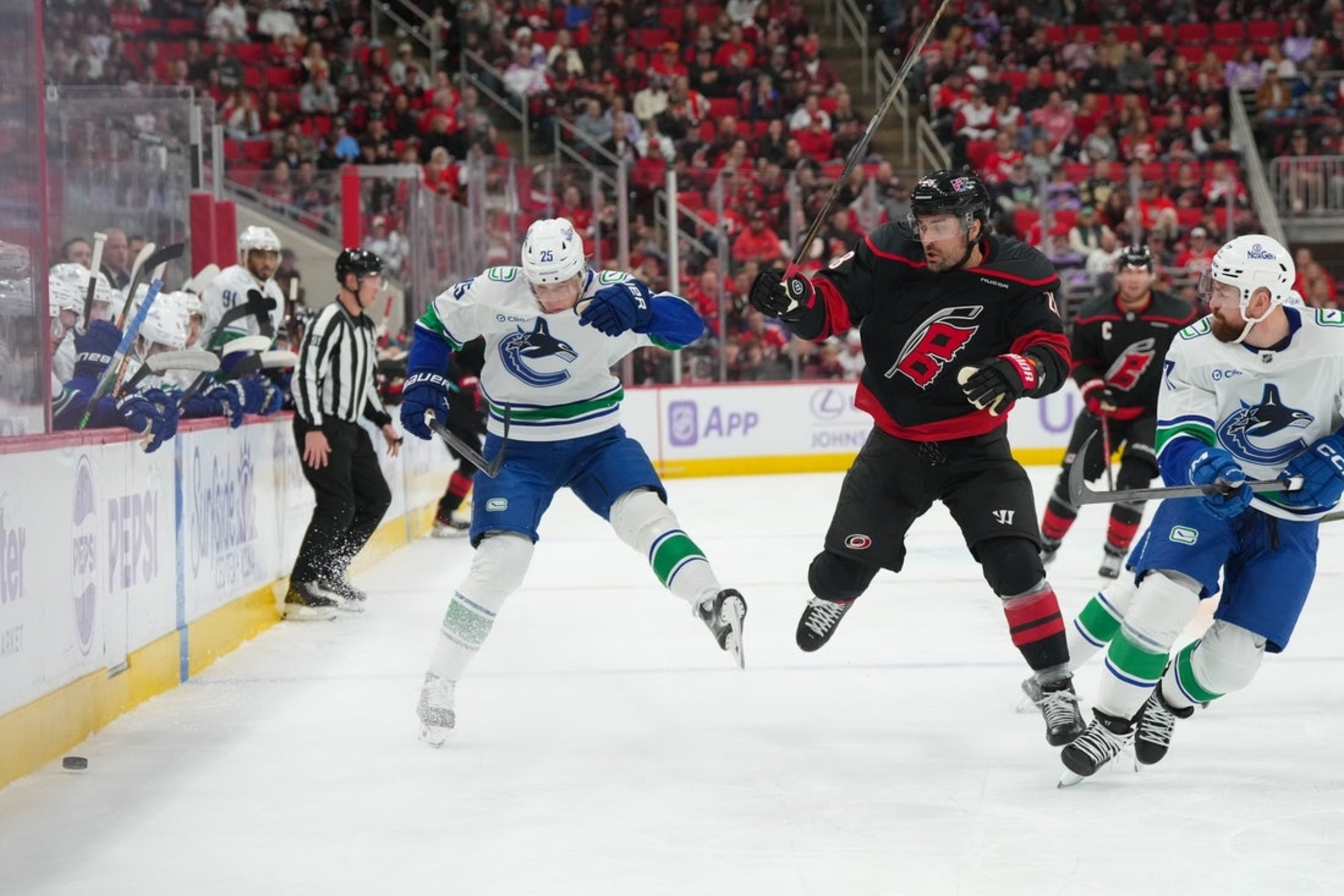 Sebastian Aho’s late OT goal propels Hurricanes past Canucks