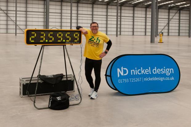 Man who cheated death raises thousands with world record van-pull attempt