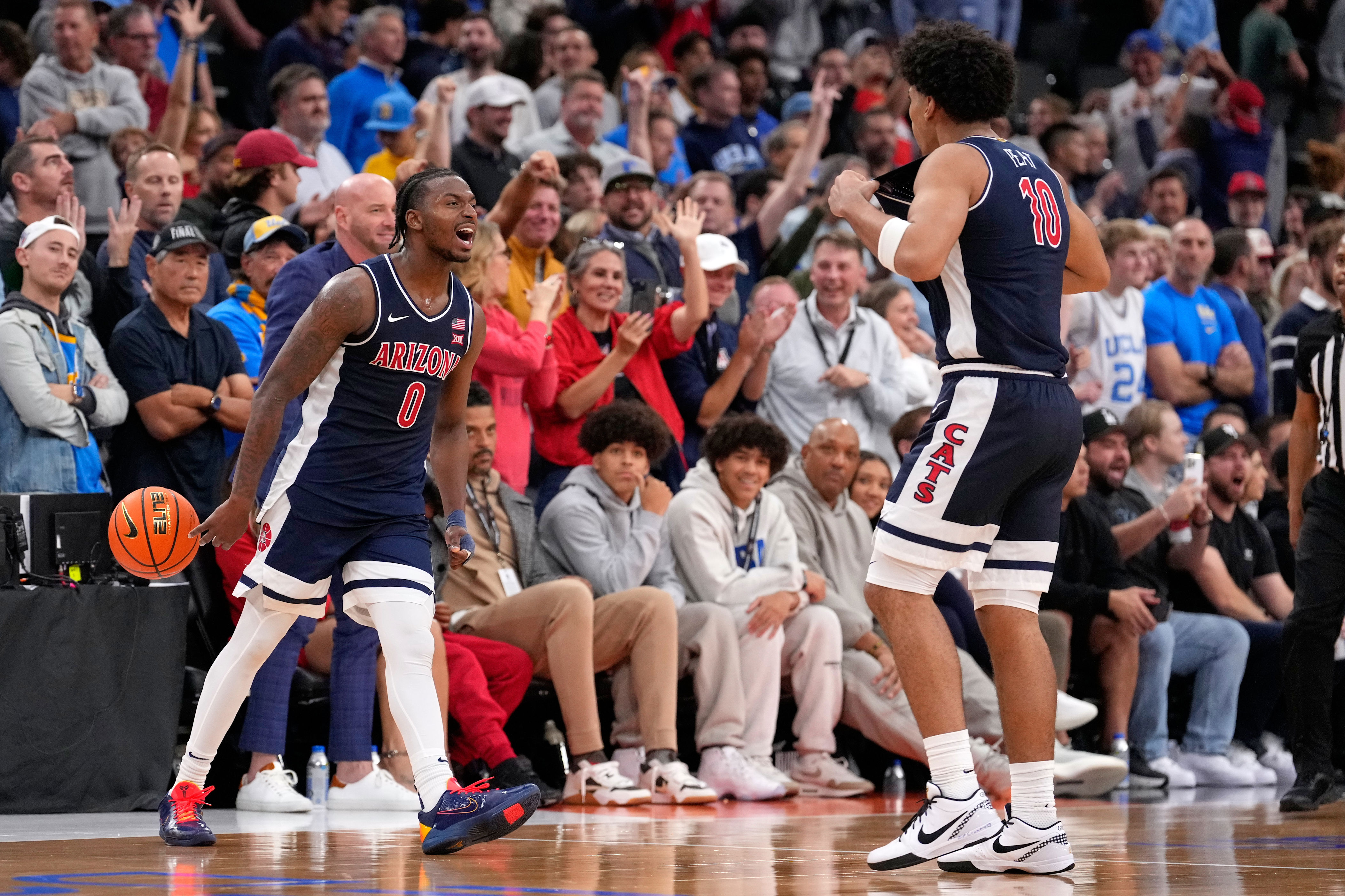 No. 5 Arizona, despite a rough night from freshman Koa Peat, survives ...