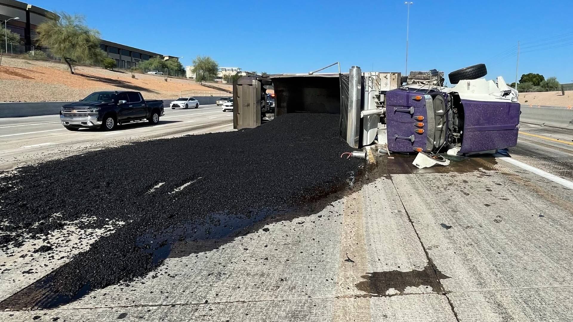 Dump truck overturns, spills hot asphalt on Loop 101 in Scottsdale
