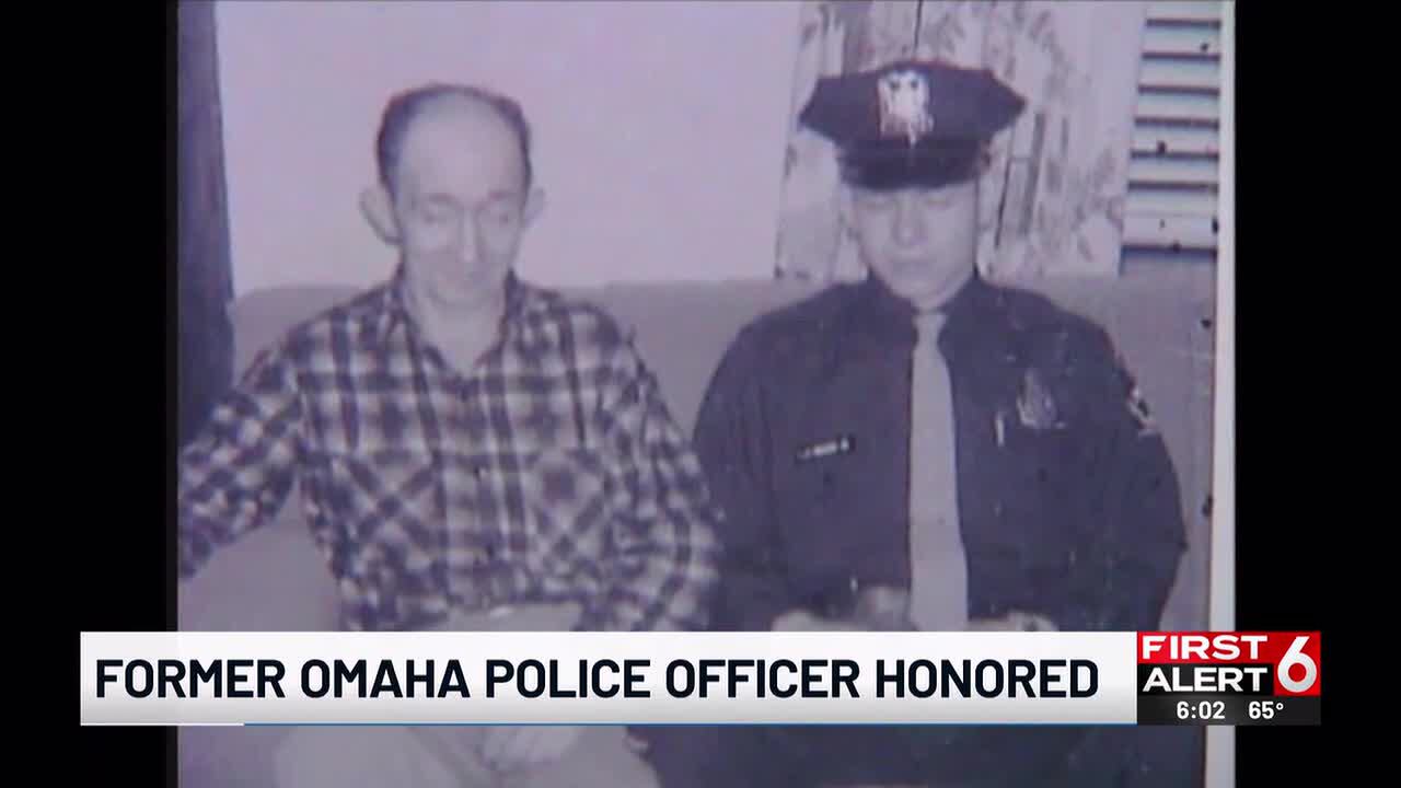 Family of fallen Omaha officer receives honor flag