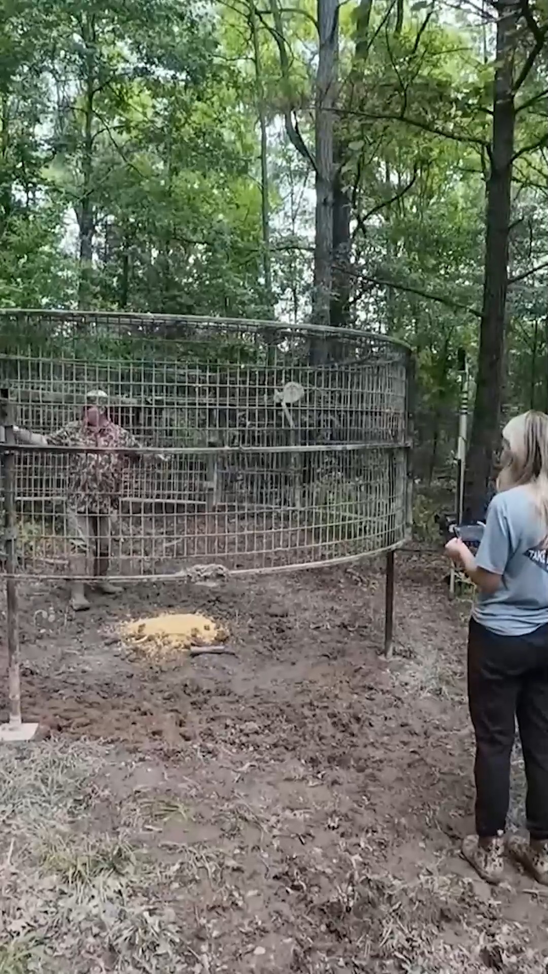 Grandpa and Granddaughters Set the Hog Trap
