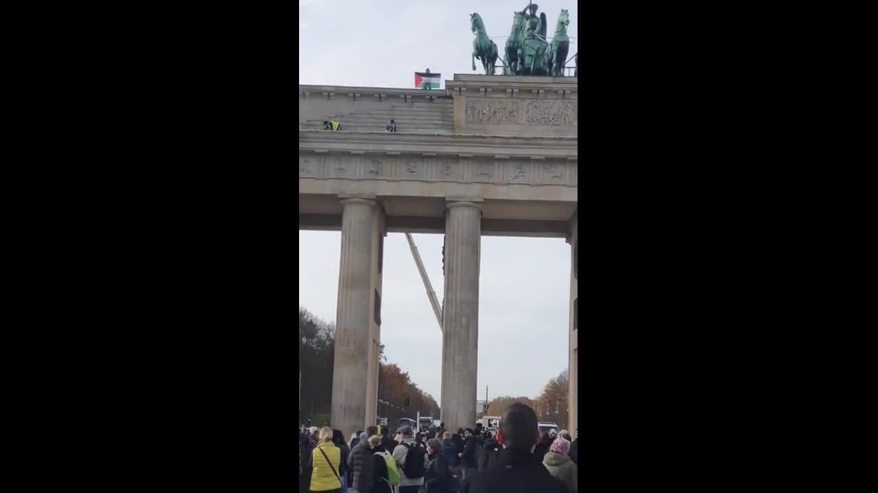 Pro-Palestinian activists protest atop Brandenburg Gate in Berlin, Germany