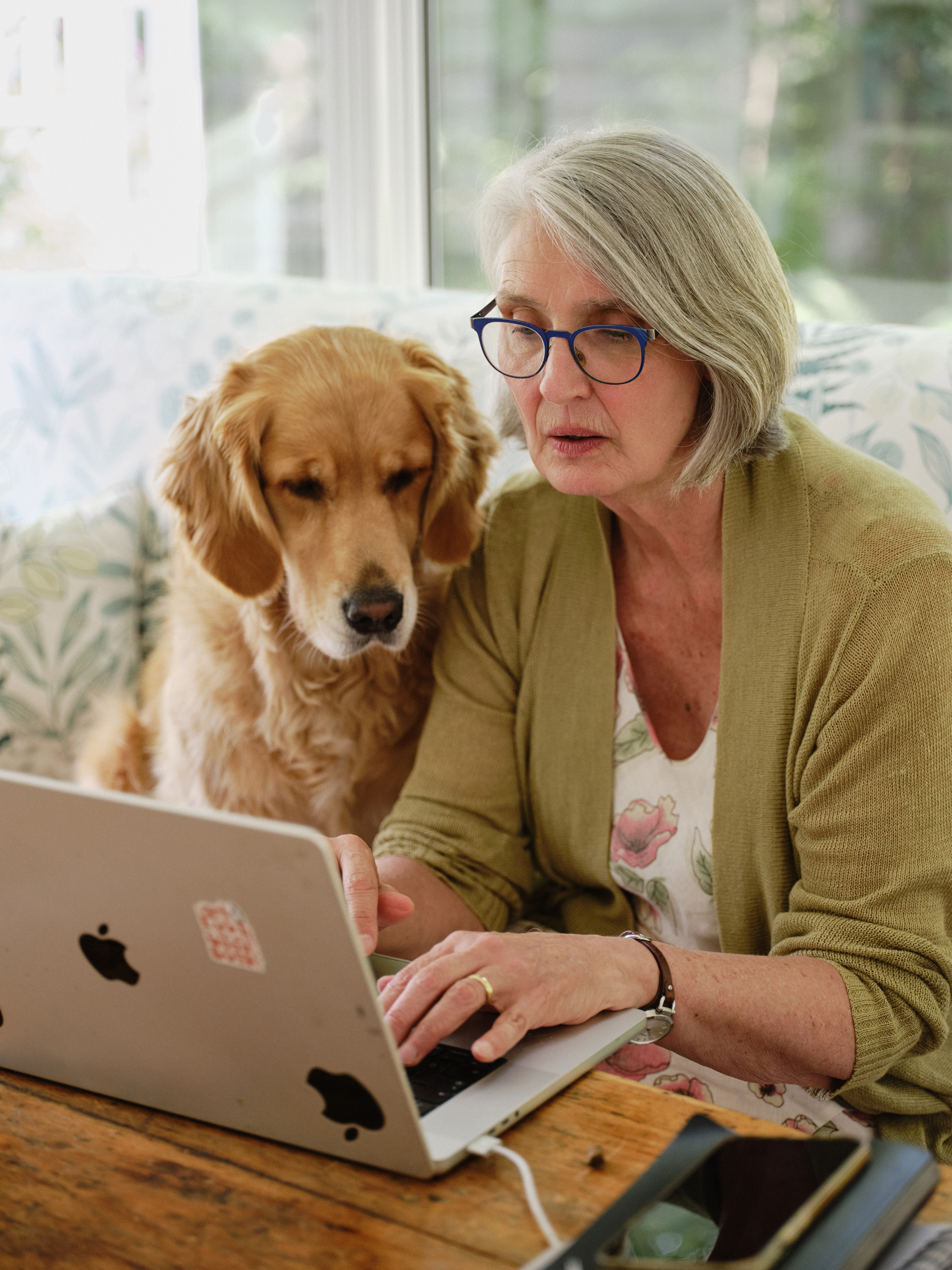 Louise Penny gives us a tour of her book collection. Her dogs come, too.