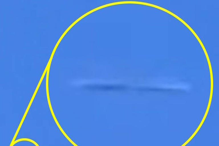 'Dish-shaped' UFO spotted 'gliding' across sky by factory workers ...