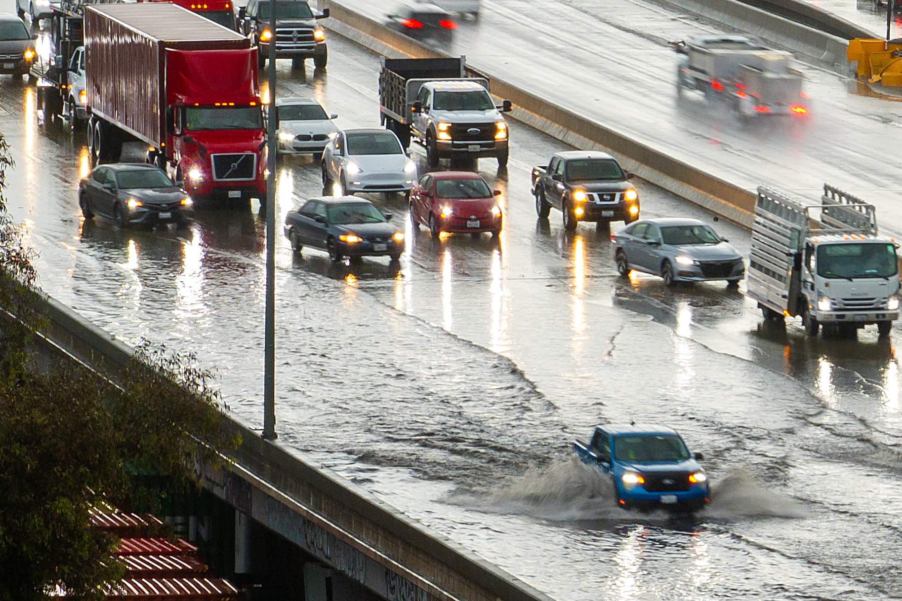 Millions told to avoid driving amid flood warning