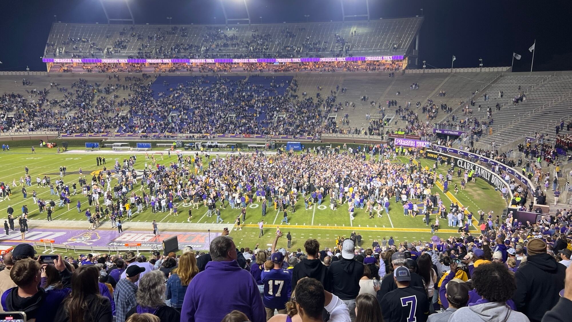 Fans rush field after ECU defeats Memphis 31-27