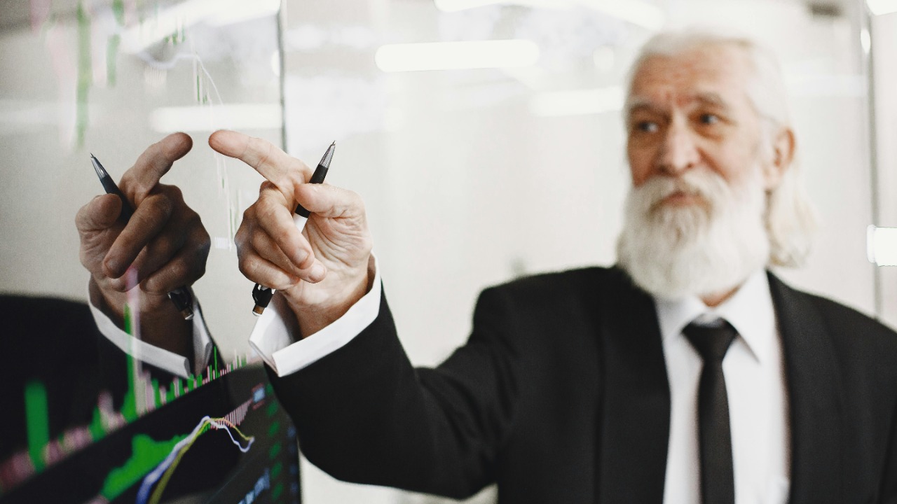 A financial expert says move from dollars to hard assets by 2030