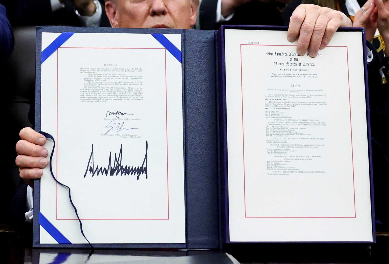 Critics pan Trump’s identical signatures after criticizing Biden for ...