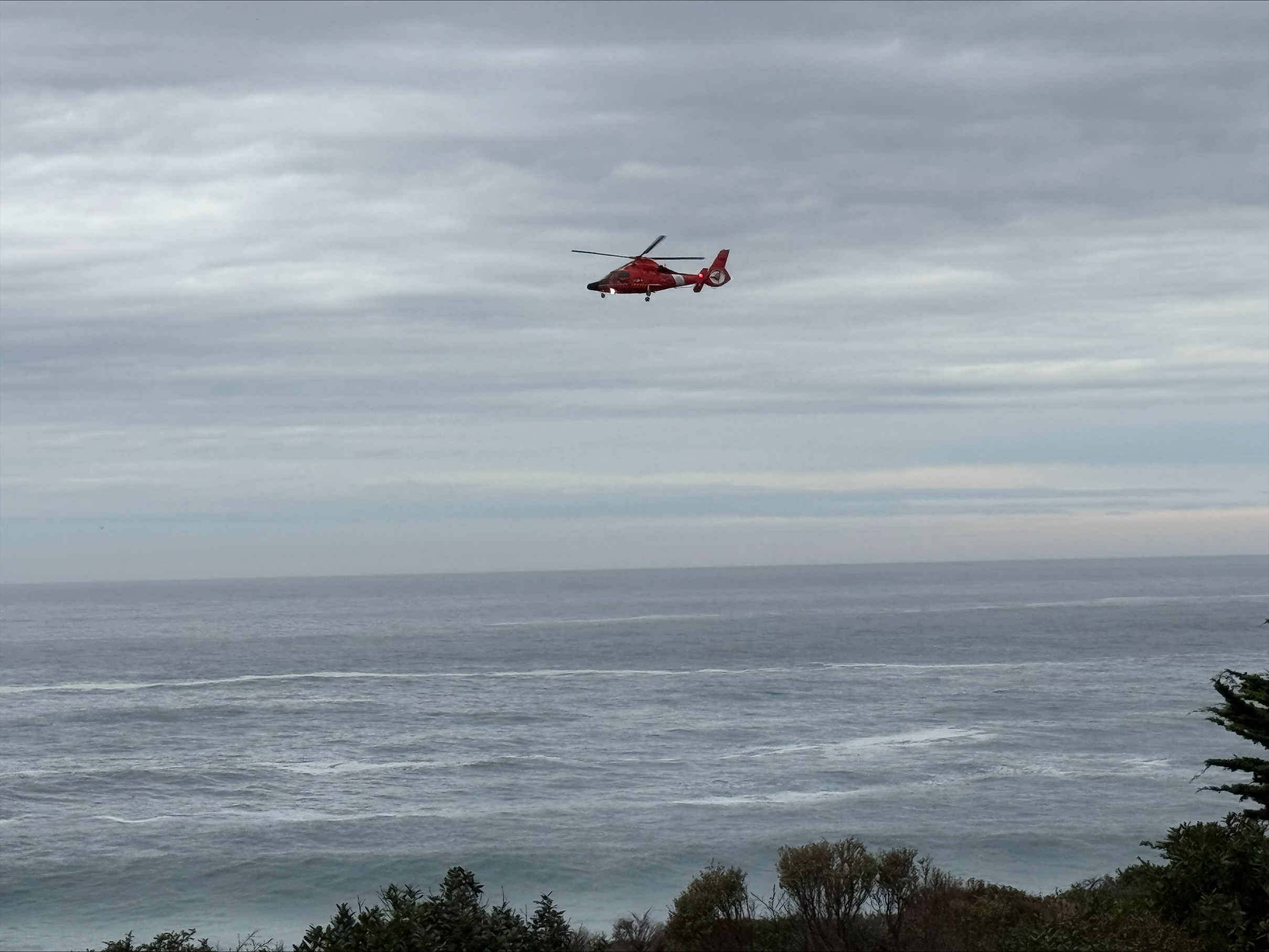 Rescuers search for 5-year-old swept into ocean after father dies