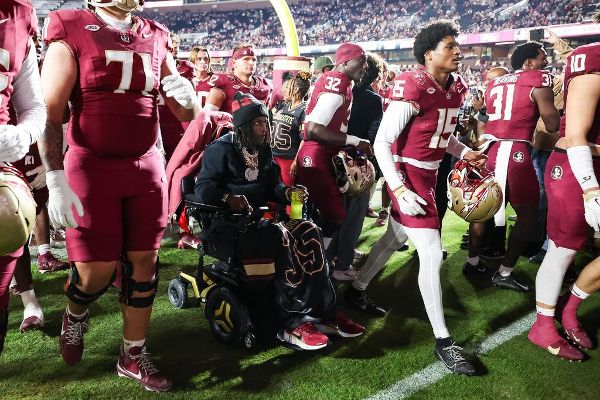 Pritchard back at FSU after shooting; determined to walk again