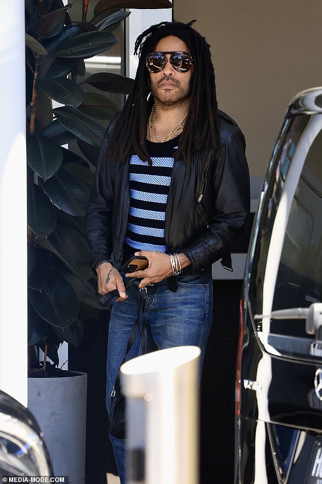 Lenny Kravitz showcases his rock star charm as he touches down in ...