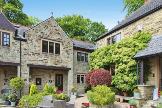 Country living in exclusive Bolton estate with 'pretty cobbled courtyard'