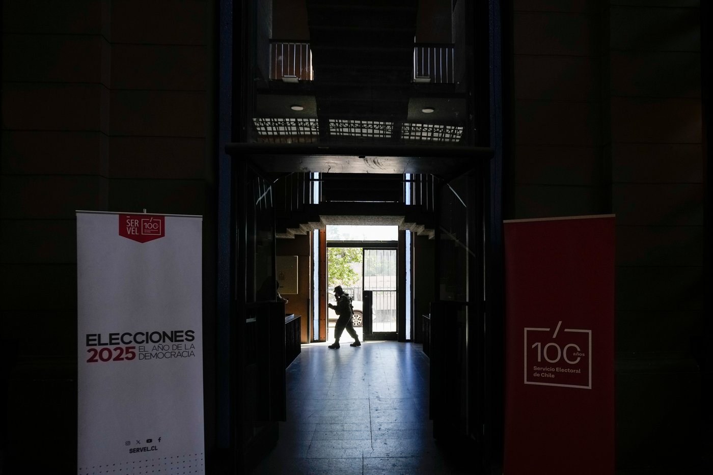 Polls open in Chile's presidential vote pitting a communist against the ...