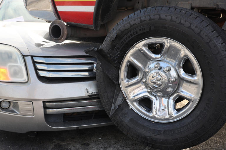 Driver injured after crashing into IFD vehicle on northwest side
