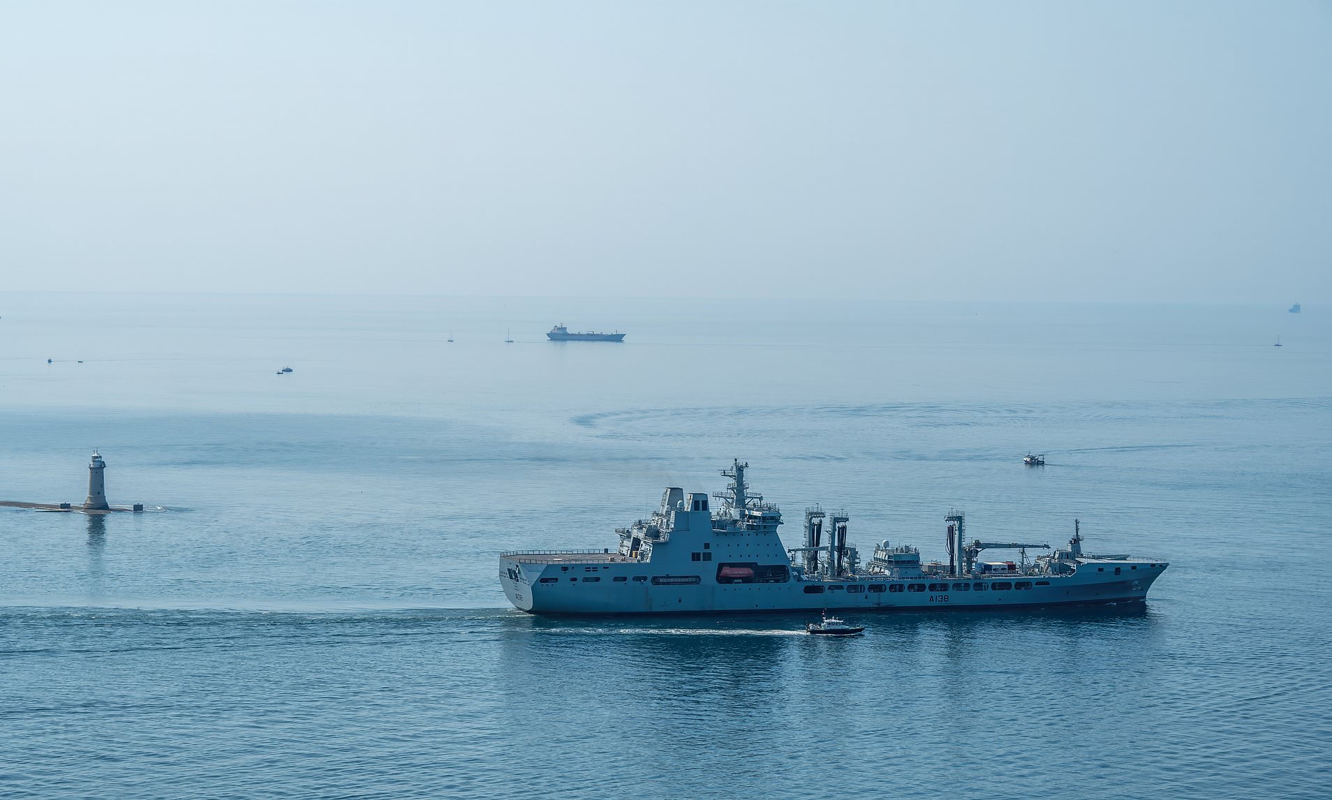 Search for a missing UK Navy crew member who fell from support vessel ...