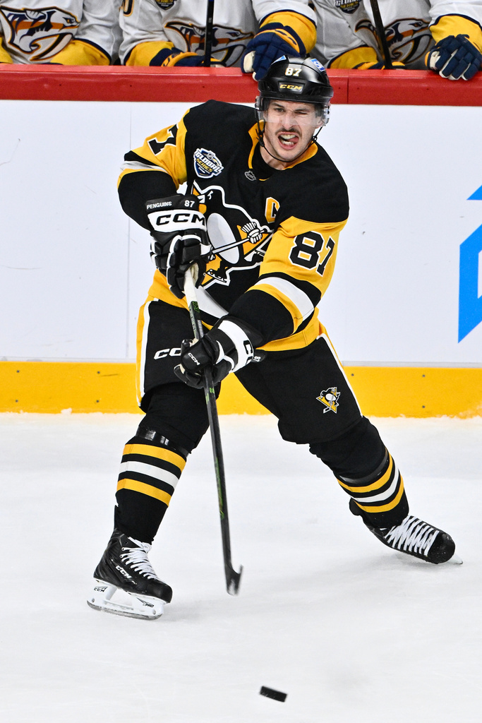 Crosby and Malkin score as the Penguins shut out the Predators 4-0 in ...