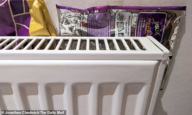 Brits are being told to put CRISP packets behind their radiators this ...