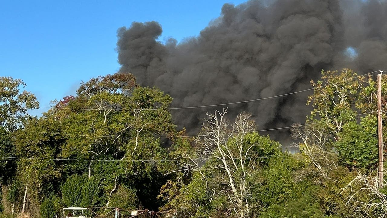 Crews working to put out fire at decommissioned electrical plant near ...