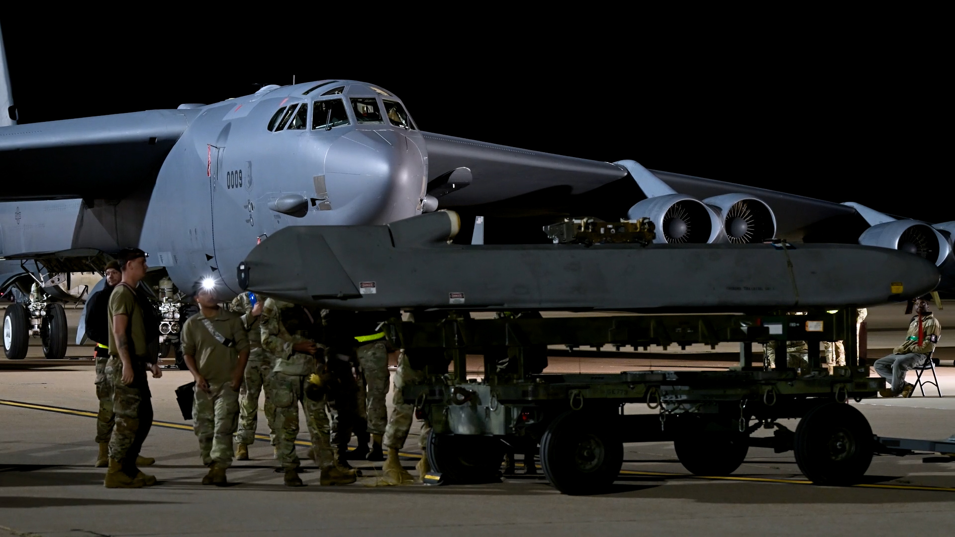 Airmen Load Training Munition onto B-52 Bomber
