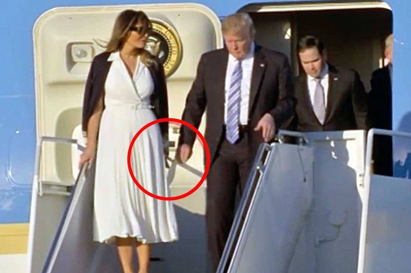 Excruciating moment Melania Trump refuses to hold Donald's hand after ...