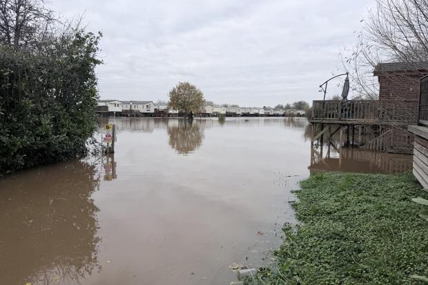 Caravan park and boatyard cut off by flood waters