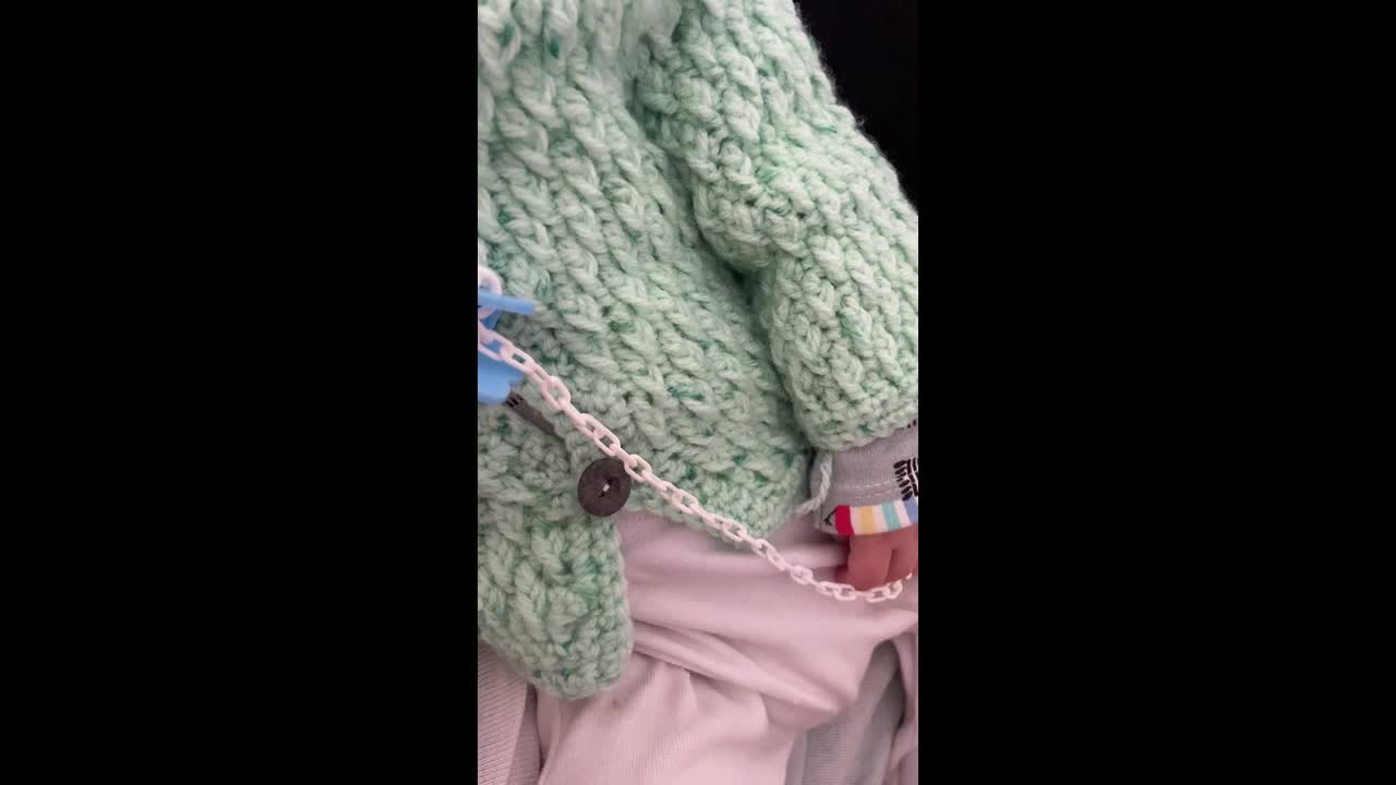 Cat lovingly licks baby’s head in Buenos Aires, Argentina