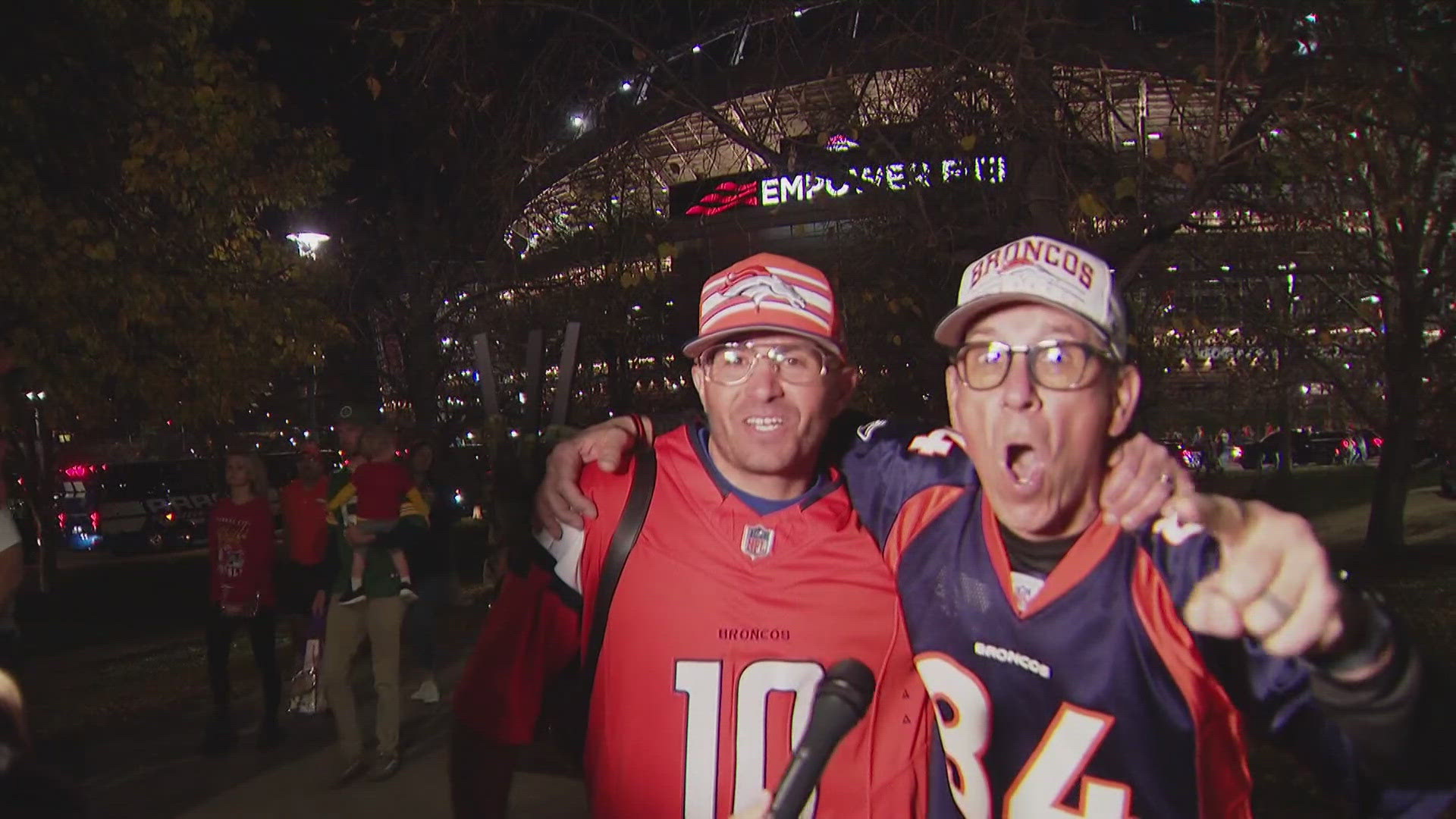Fans celebrate as Broncos beat the Chiefs