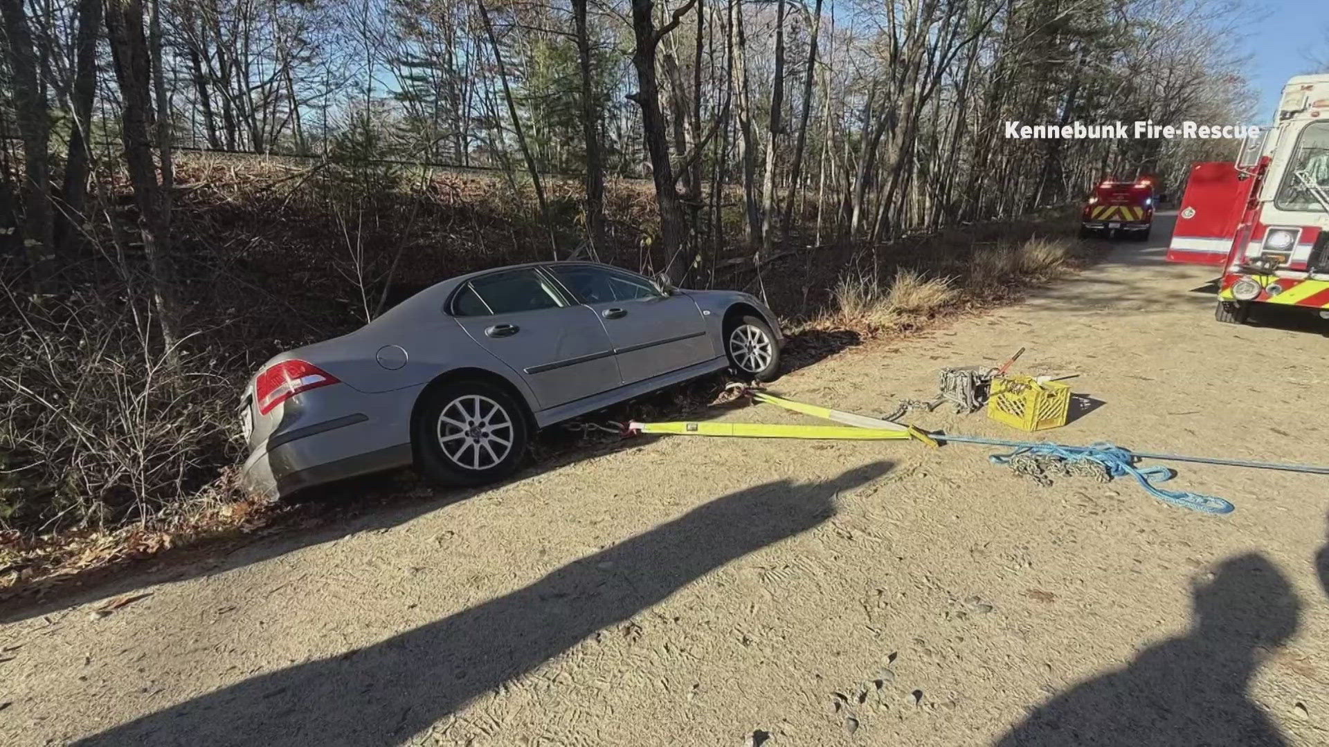 Kennebunk firefighters stabilize car teetering over 15-foot drop into river