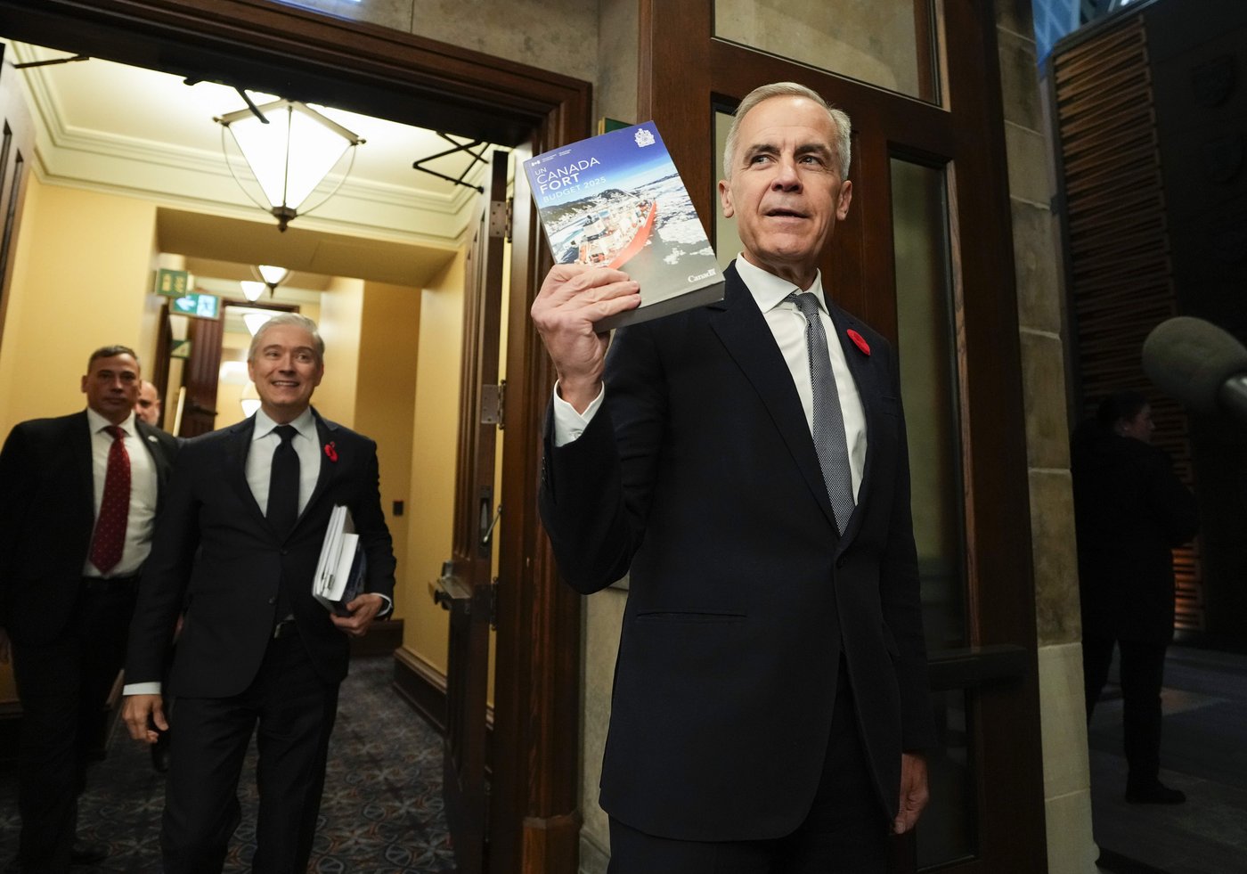 May says she'll vote yes on Liberal budget after Carney makes climate ...