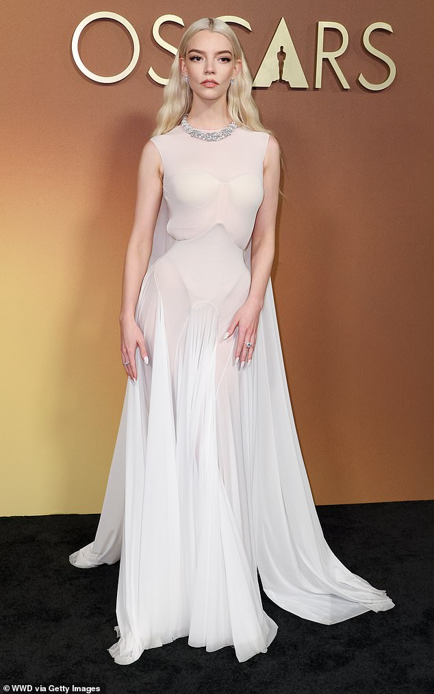 Anya Taylor-Joy looks angelic in white corseted couture number at star ...